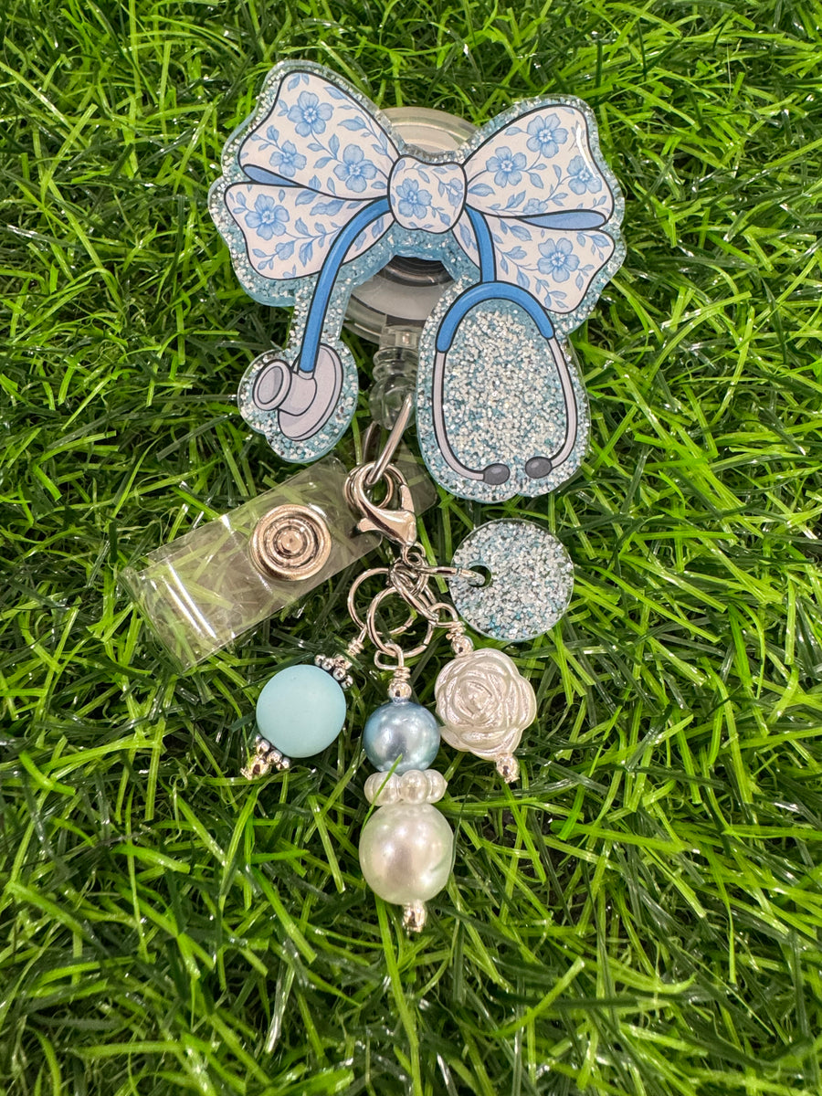 Blue Floral Stethoscope Bow Retractable Badge Reel – SG Designs By Danielle